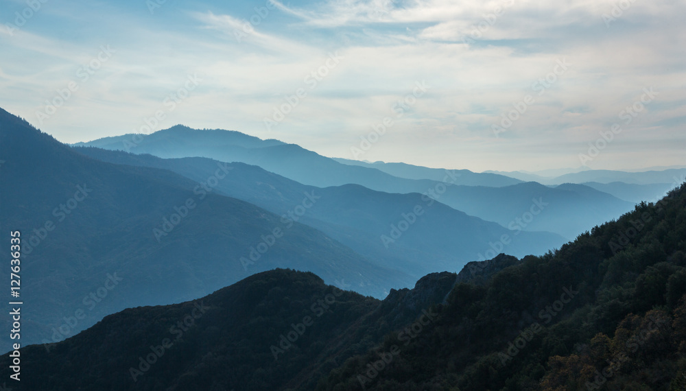 Stock-Foto „Fantastic evening light in misty valley hidden in the rocky ...