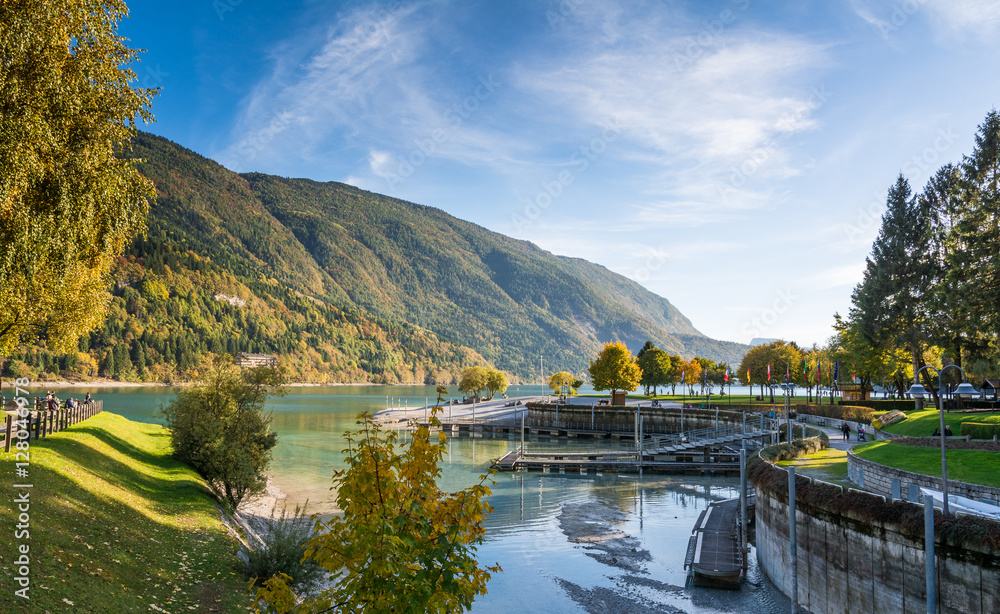 Molveno lake in Dolomites, Italy. Located at the shore of Molveno lake ...