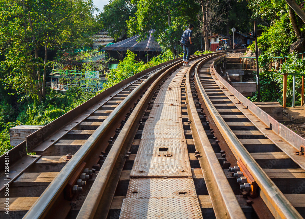 Railroad track curve around a bend in thailand Stock Photo | Adobe Stock