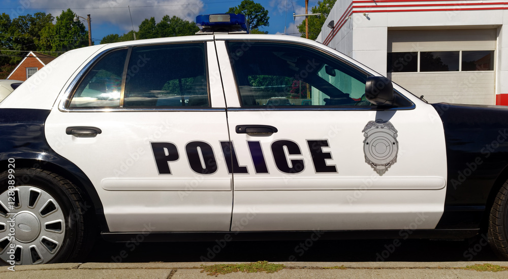 Side view of black and white police car. Horizontal. Stock Photo ...