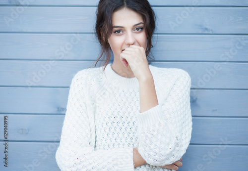 Beautiful natural young smiling shy friendly brunette woman wearing ... Beautiful natural young smiling shy friendly brunette woman wearing ...