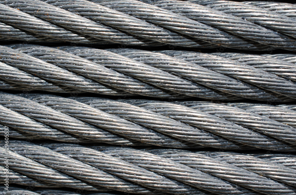 Steel sturdy, heavy duty cable wires. Up close of cable wire that is ...