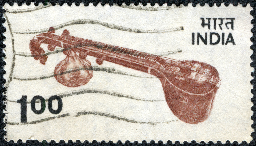 stamp printed in India, shows Veena - plucked string instrument used in ...