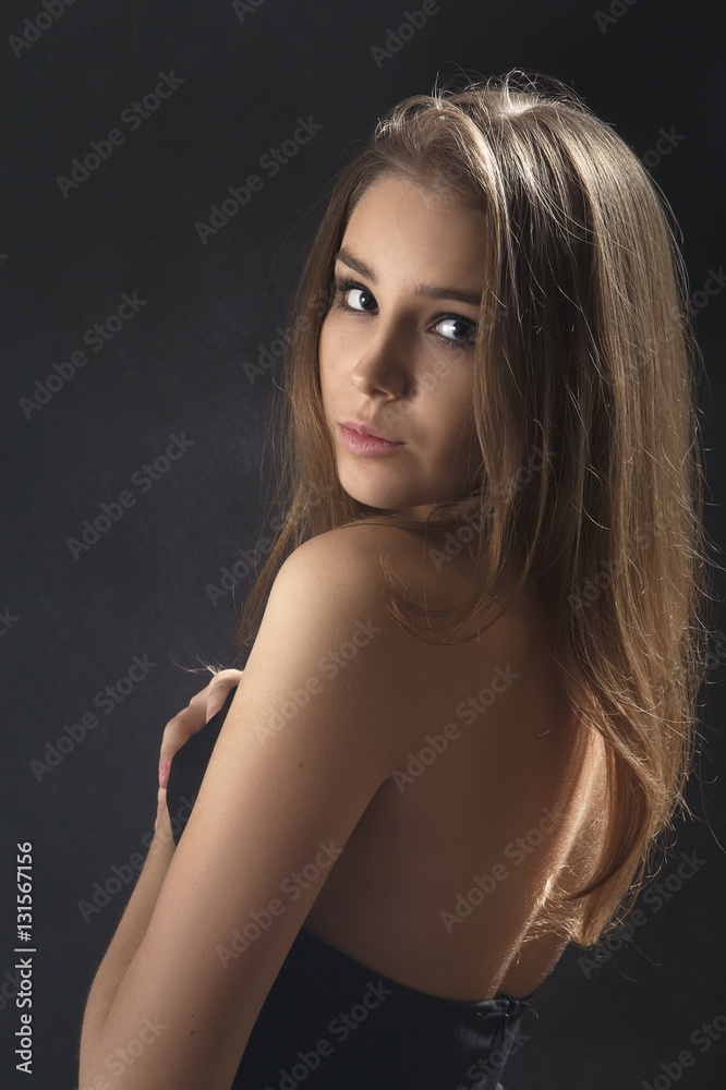 Woman Looking Back Over Shoulder
