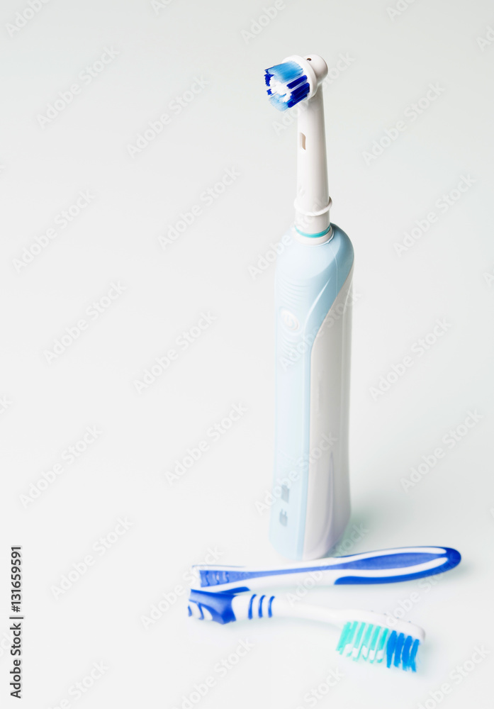 electric toothbrush and broken old Stock Photo | Adobe Stock