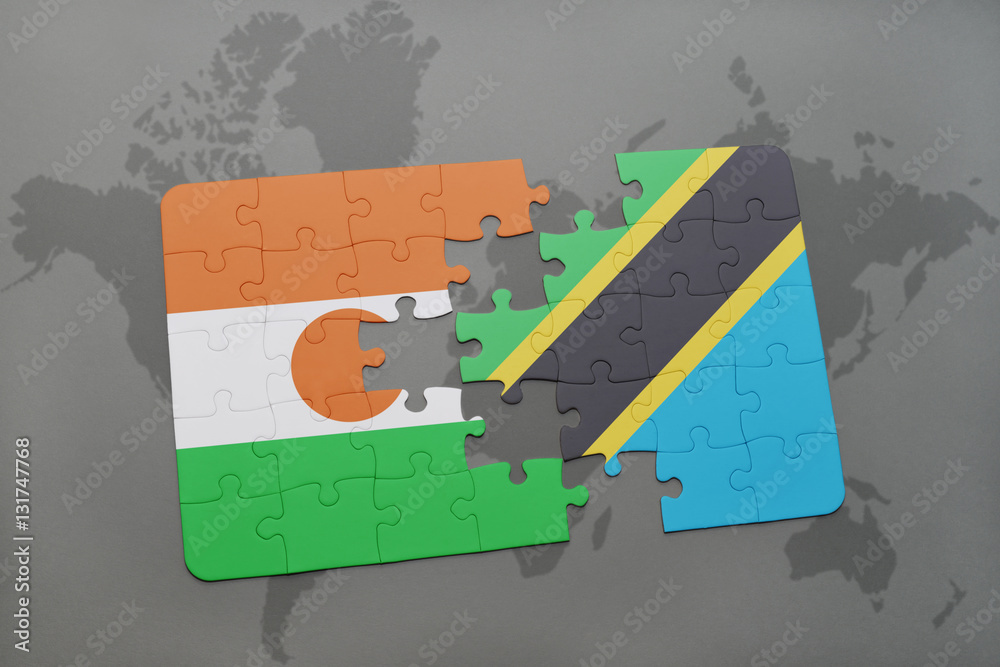 puzzle with the national flag of niger and tanzania on a world map ...