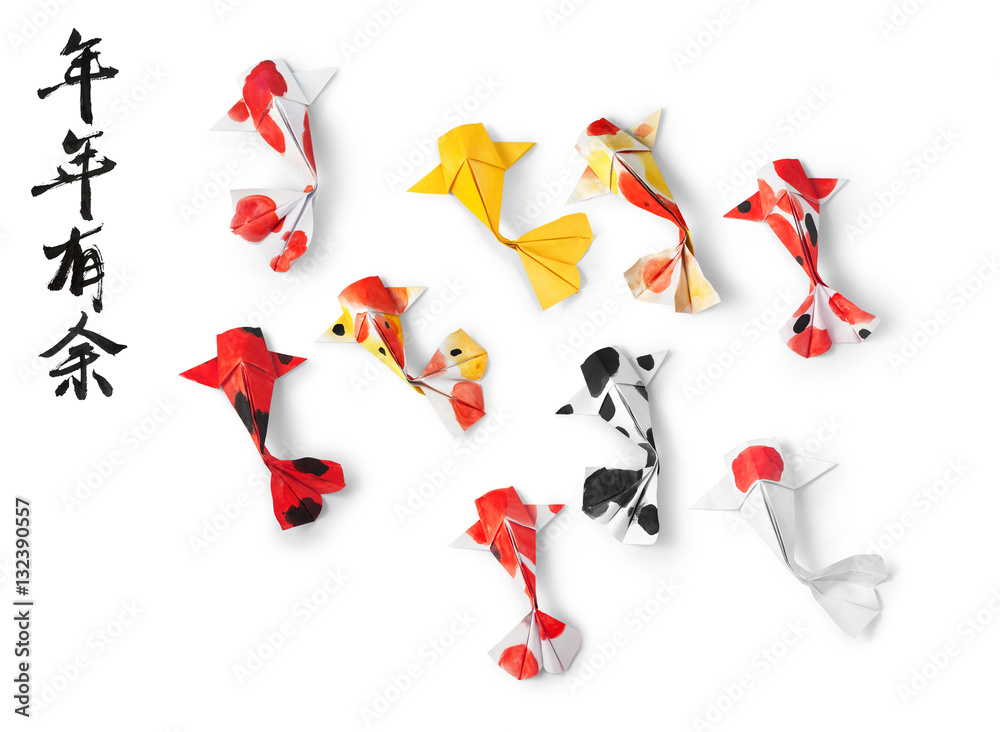 Handmade paper craft origami koi carp fish on white background ...