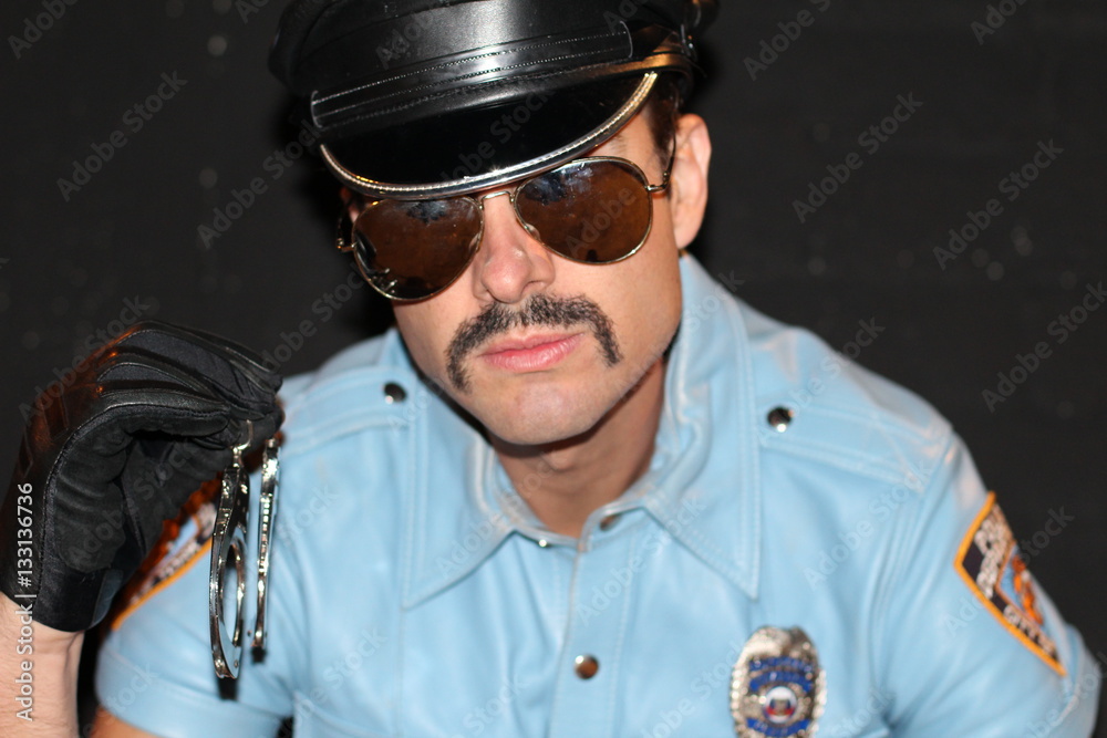 Cop with mustache, sunglasses and hat Stock Photo | Adobe Stock