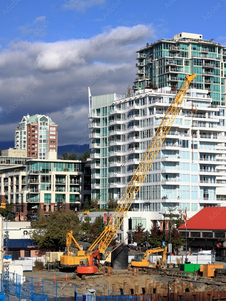Preparation of the construction site to create a foundation for a new ...