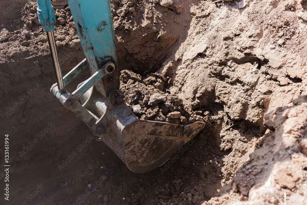 Working Excavator Tractor Digging A Trench. Stock Photo | Adobe Stock