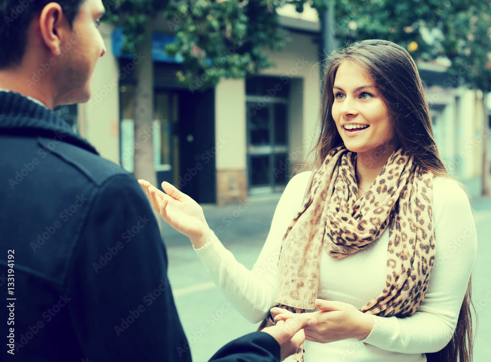 Girl flirting with guy at the street Stock Photo | Adobe Stock