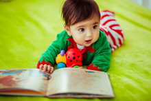 Baby Looking At The Book Free Stock Photo - Public Domain Pictures
