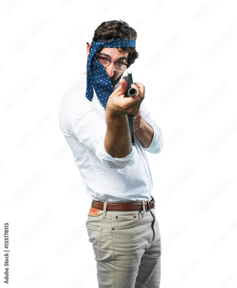young funny man with machine gun Stock Photo | Adobe Stock