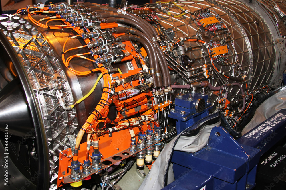 External structure and pipe work on a jet engine. Stock Photo | Adobe Stock