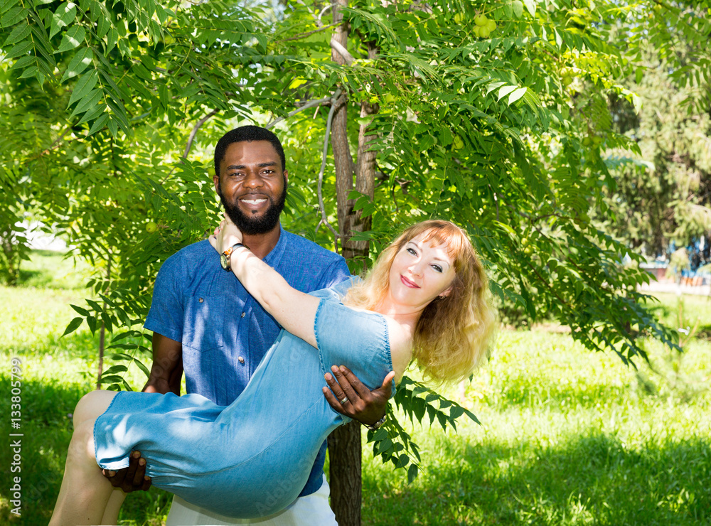 Happy young romantic couple in love. Black man and white woman. Love ...