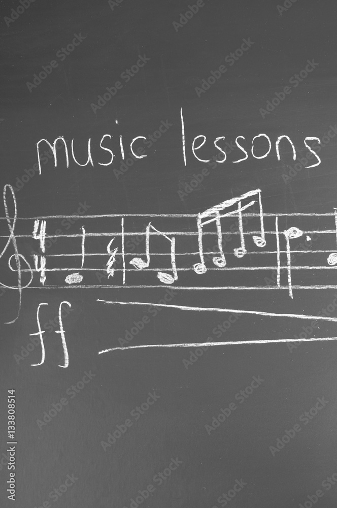 Musical notes on a blackboard Stock Photo | Adobe Stock
