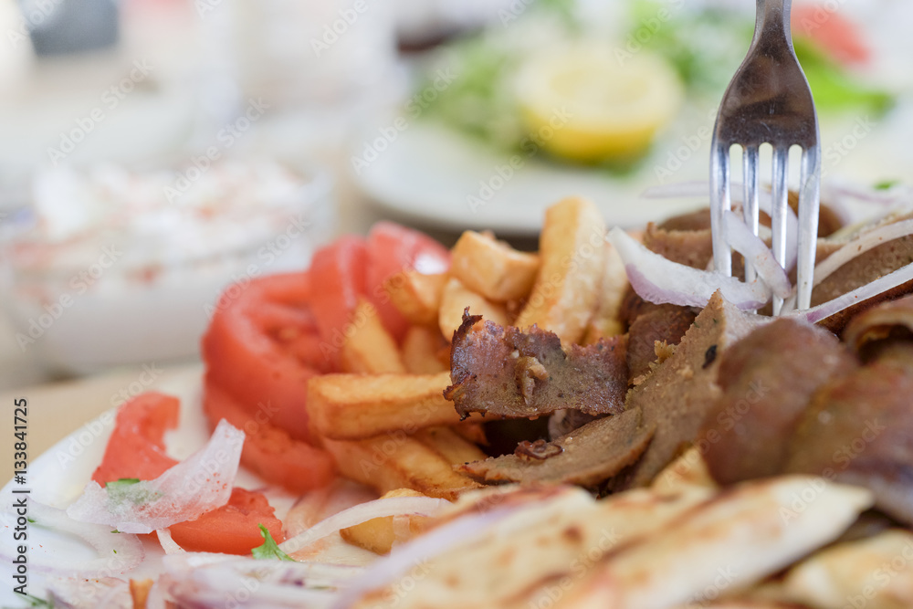 Turkish doner, Greek gyros, meat, fried potatoes, tomatoes and onions ...