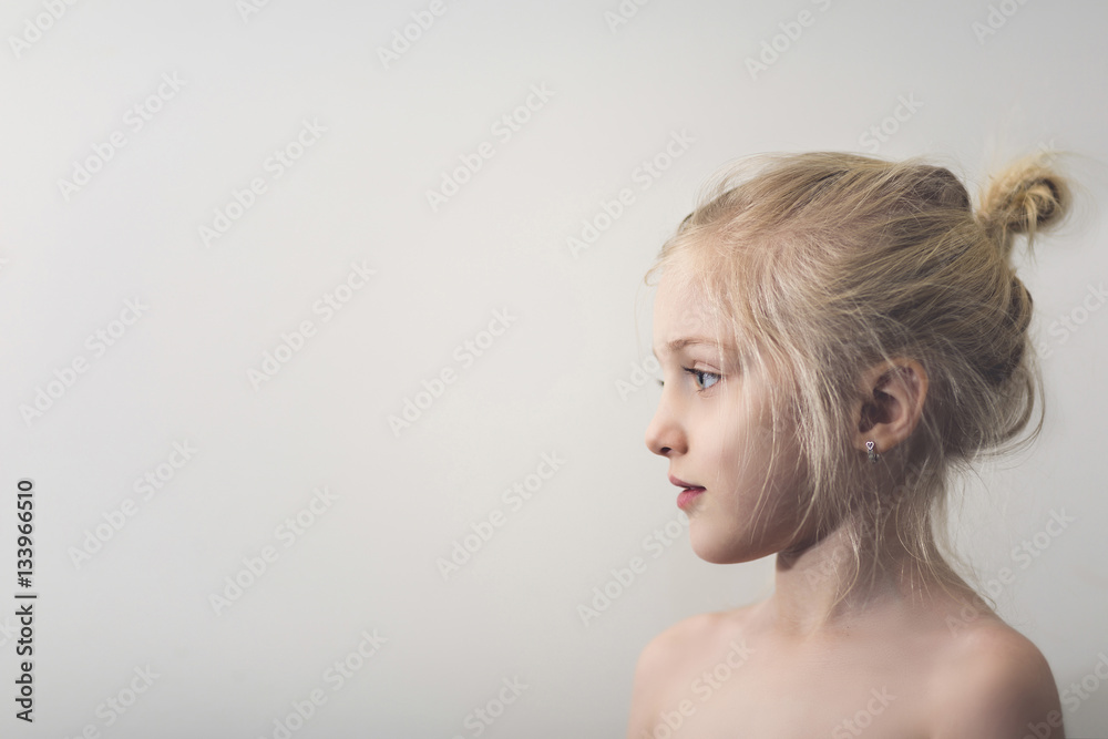 Side view of cute shirtless girl standing against wall at home Stock ...