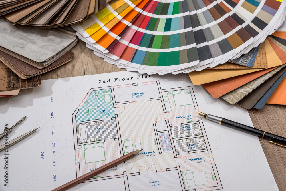 architectural drawings with palette of colors and wooden sampler for ...