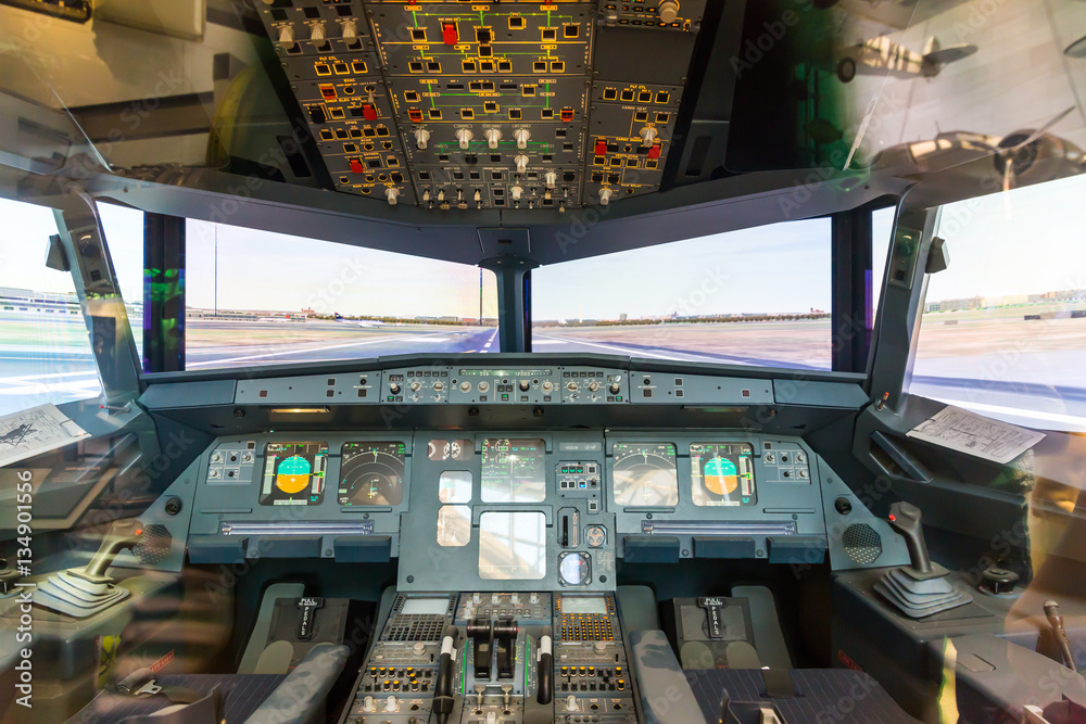 Inside airplane pilot cabin. Stock Photo | Adobe Stock