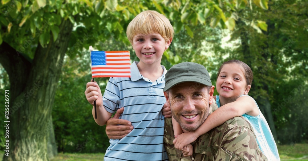 Portrait of father in soldier uniform with their kids at park Stock ...