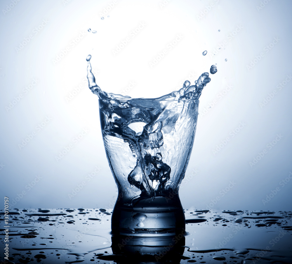 water splash in glasses isolated on white Stock Photo | Adobe Stock