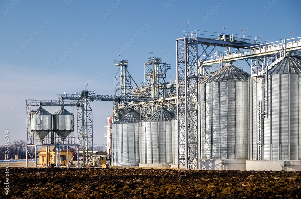 The complex silo installations for the storage of grain standing in the ...