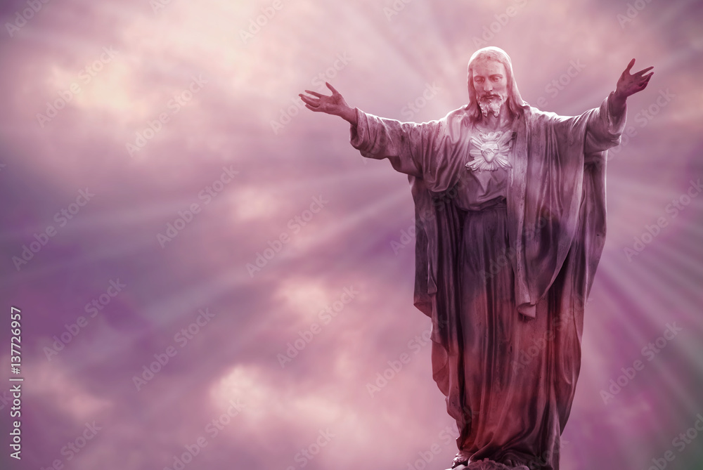 Jesus Christ statue against beautiful sky background Stock Photo ...