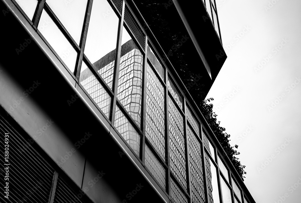 windows of commercial building in Hong Kong with B&W color Stock Photo ...
