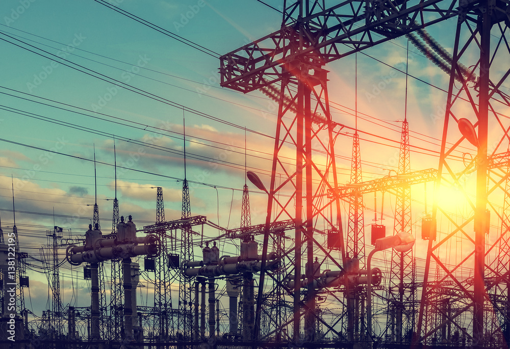 electricity distribution station at sunset. Stock Photo | Adobe Stock