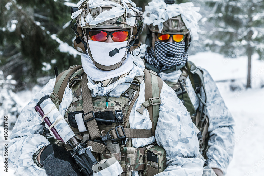 Winter arctic mountains warfare. Action in cold conditions. Soldiers ...