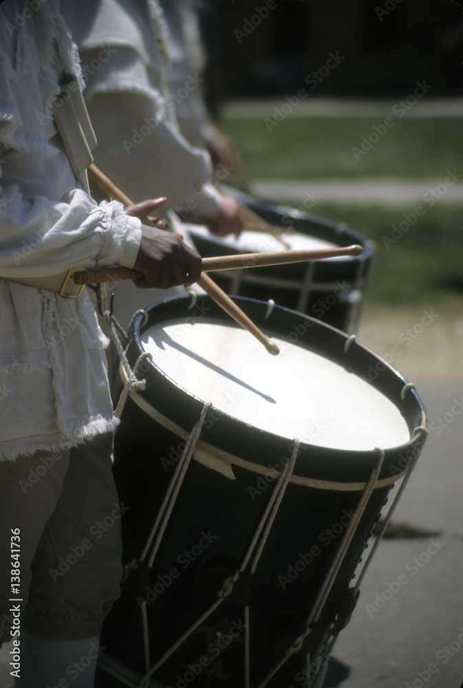 Drummers in white colonial uniforms Stock Photo | Adobe Stock