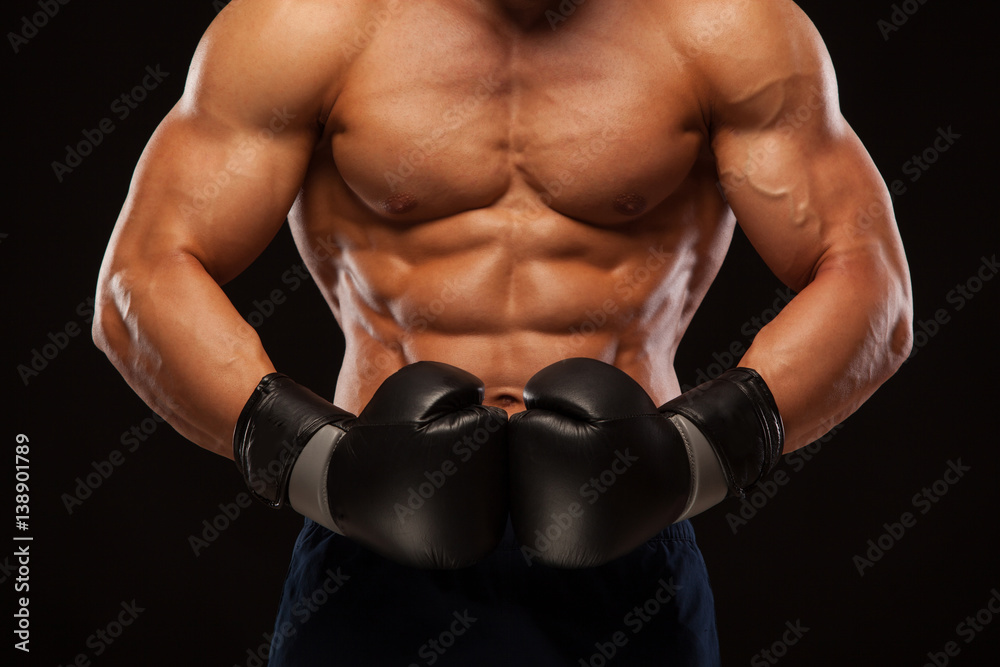 Muscular young man with perfect Torso with six pack abs, in boxing ...