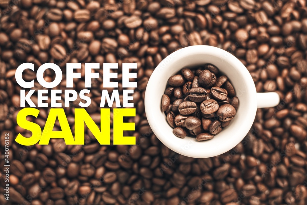 Foto de Stock Cup full of coffee beans on a blurred coffee bean ...