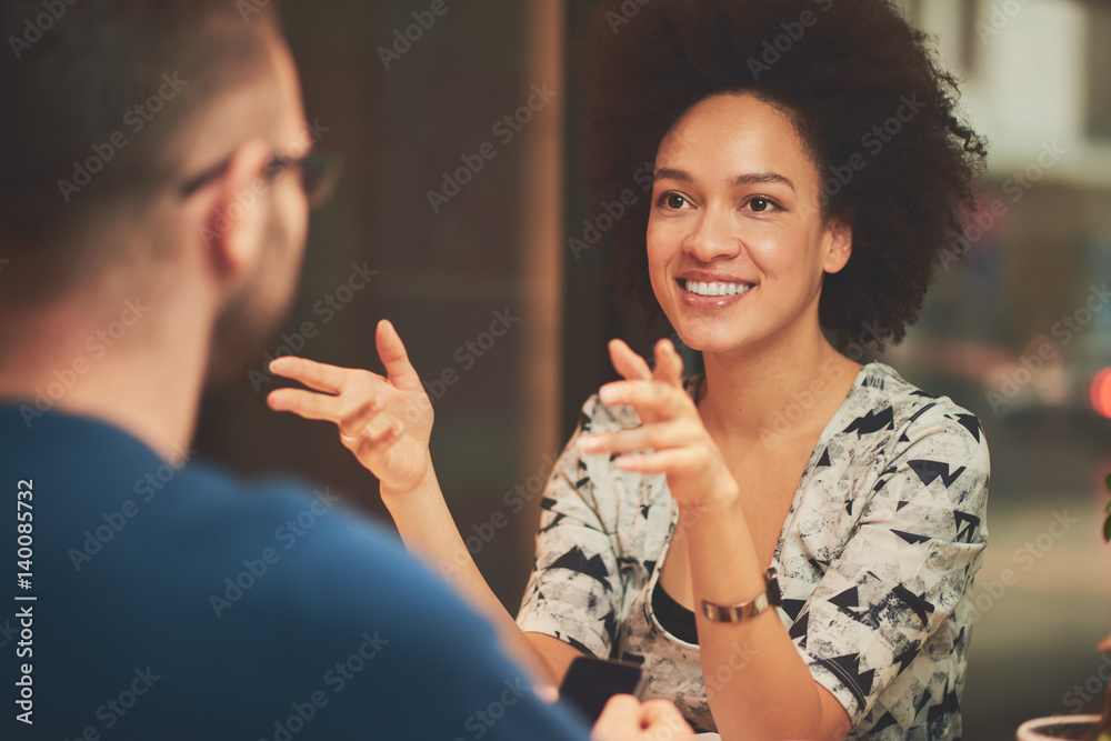 Friends having coffee, smiling and gossip. Stock Photo | Adobe Stock