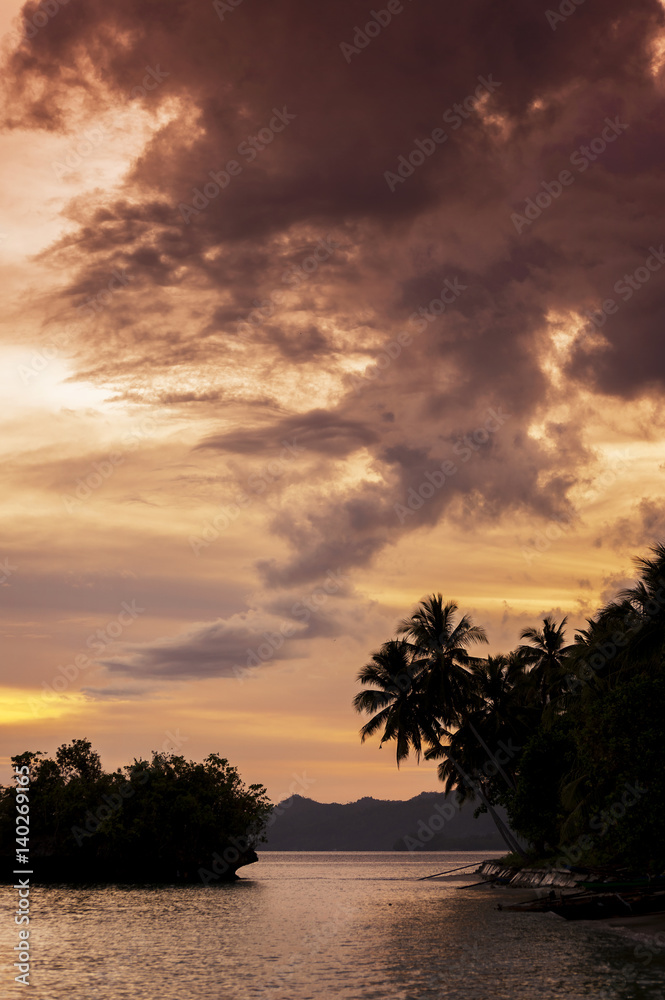 Waigeo Island Indonesian Sunset. A colorful sunset in the Saporkren ...