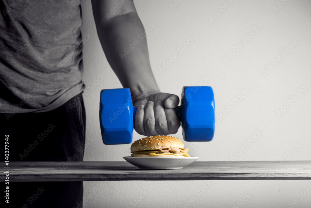 male hand reaching to pick up dumbbell idea Exercises For Weight Loss ...