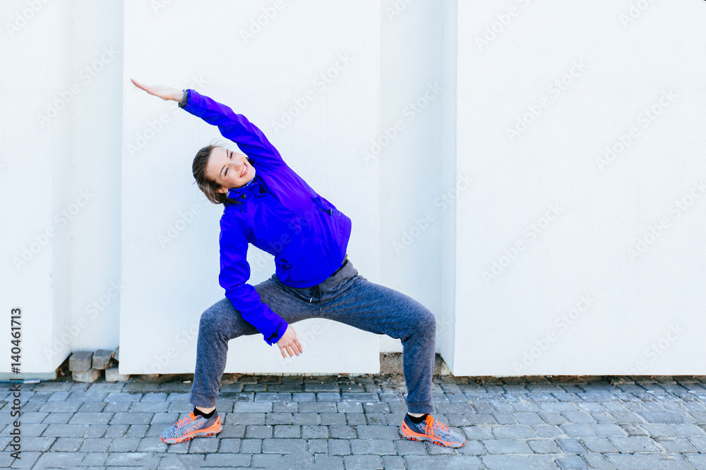 Series photos of gorgeous sportswoman doing stretching exercises over ...