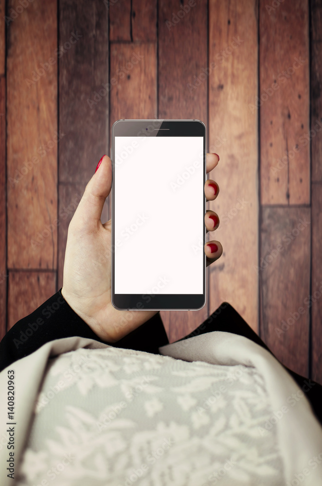 Top view mockup of modern black phone with isolated screen in female ...