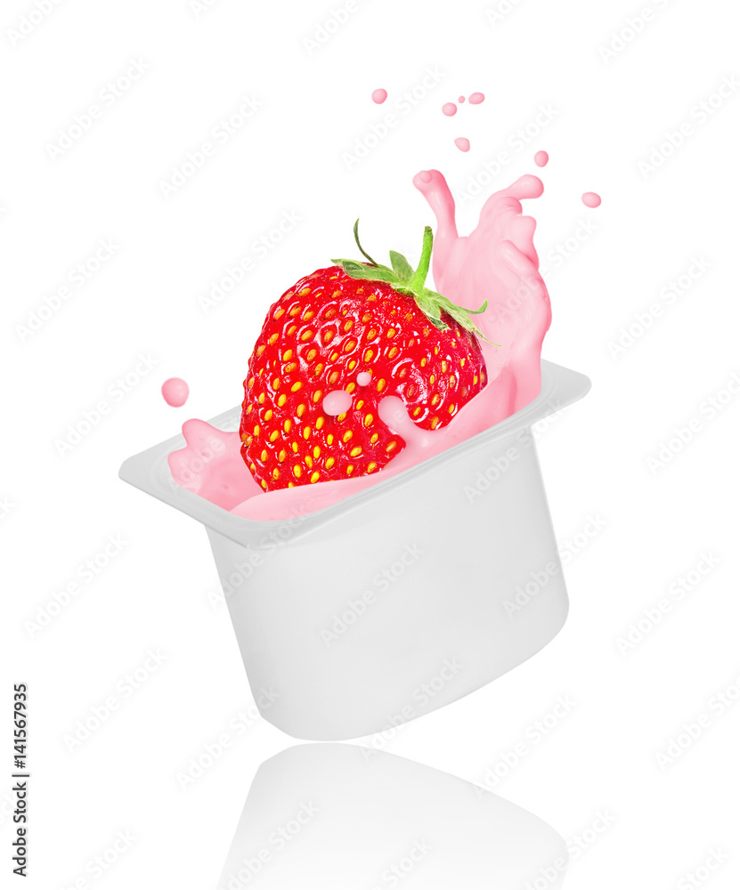 Strawberry falling into yogurt splash in plastic packing, isolated on white background Stock ...
