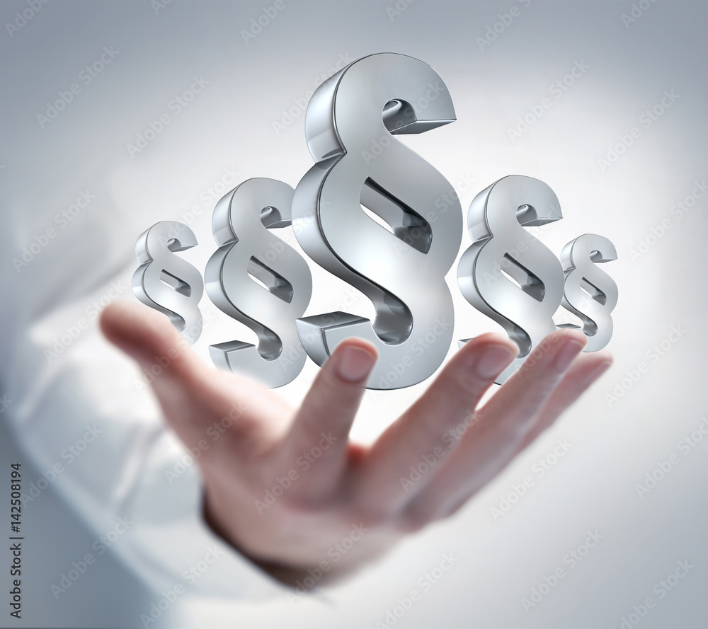 Hand mit Paragraphen-Symbolen Stock Photo | Adobe Stock