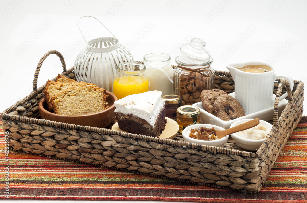 Breakfast vanilla budin, chocolate chip cookies and chocolate cake with ...
