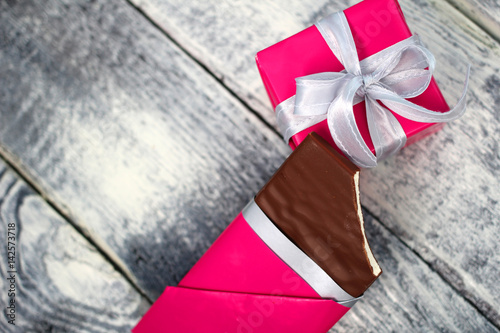 Chocolate in a pink wrapper Stock Photo | Adobe Stock