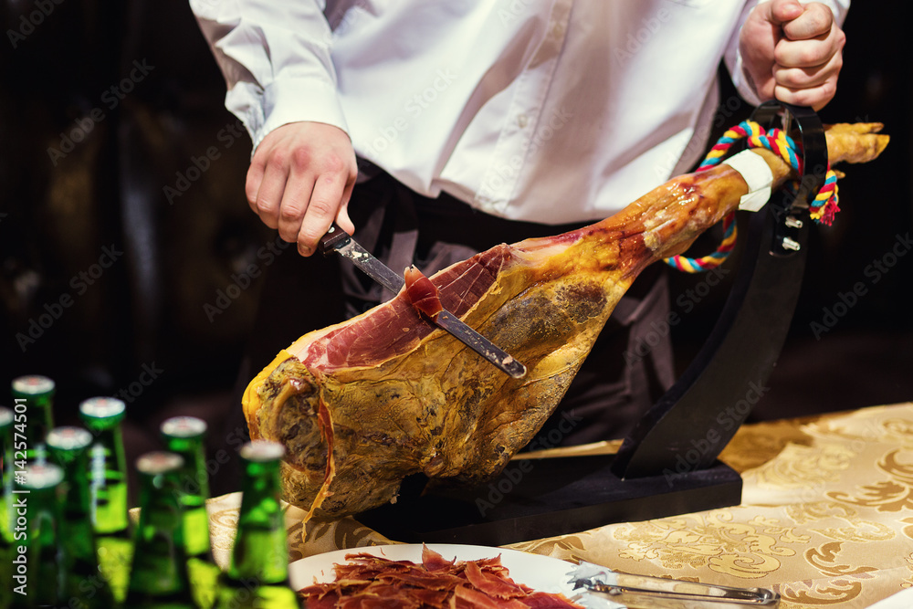 Photo Stock Jamon. Jamon serrano. Traditional Spanish ham on black ...