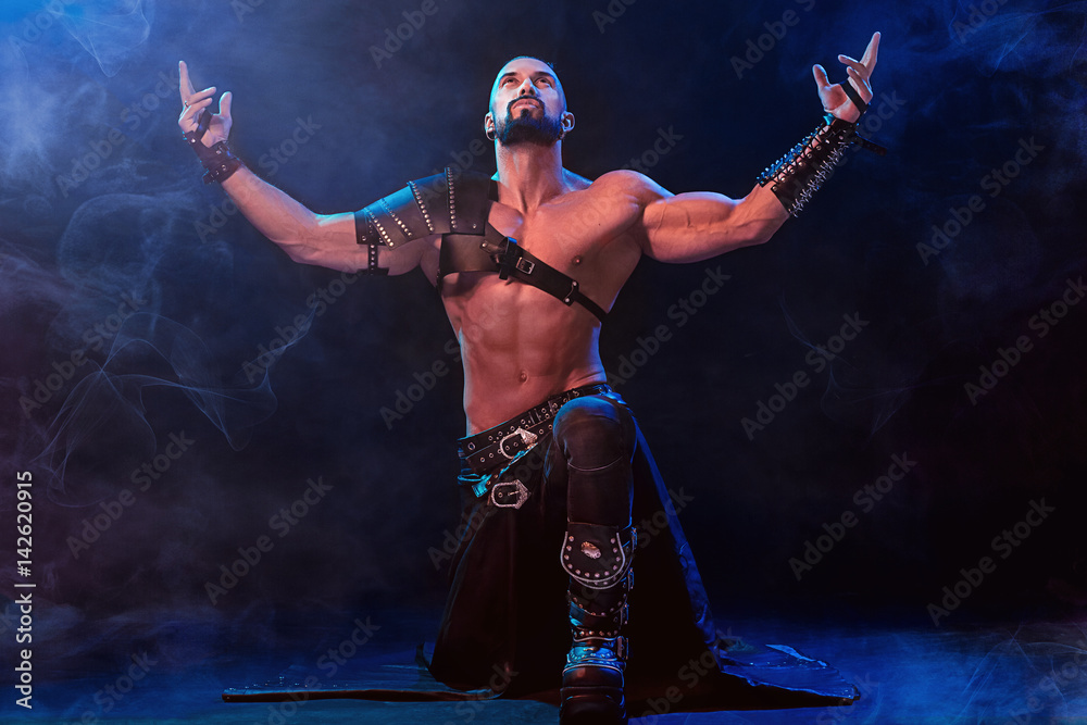 Handsome young sexy man with beautiful muscular chest in interesting ...