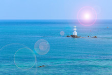 Lighthouse With Lens Flare Free Stock Photo - Public Domain Pictures