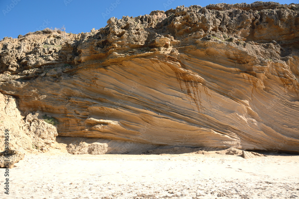 Sedimentary rock/ Cemented sand dunes created by the processes of ...