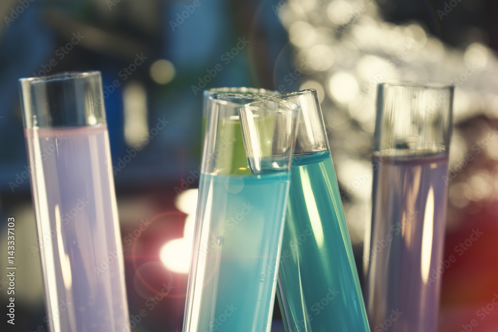 Colorful Laboratory Research Tubes with liquid for cancer research ...