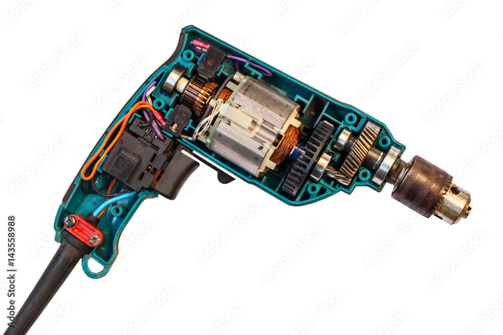 Disassembled electric drill isolated on white background, opened cover ...