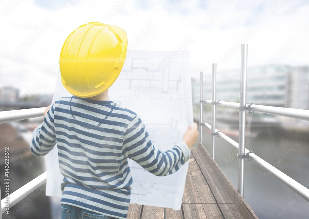 Boy looking blueprint in 3D scaffolding Stock Photo | Adobe Stock